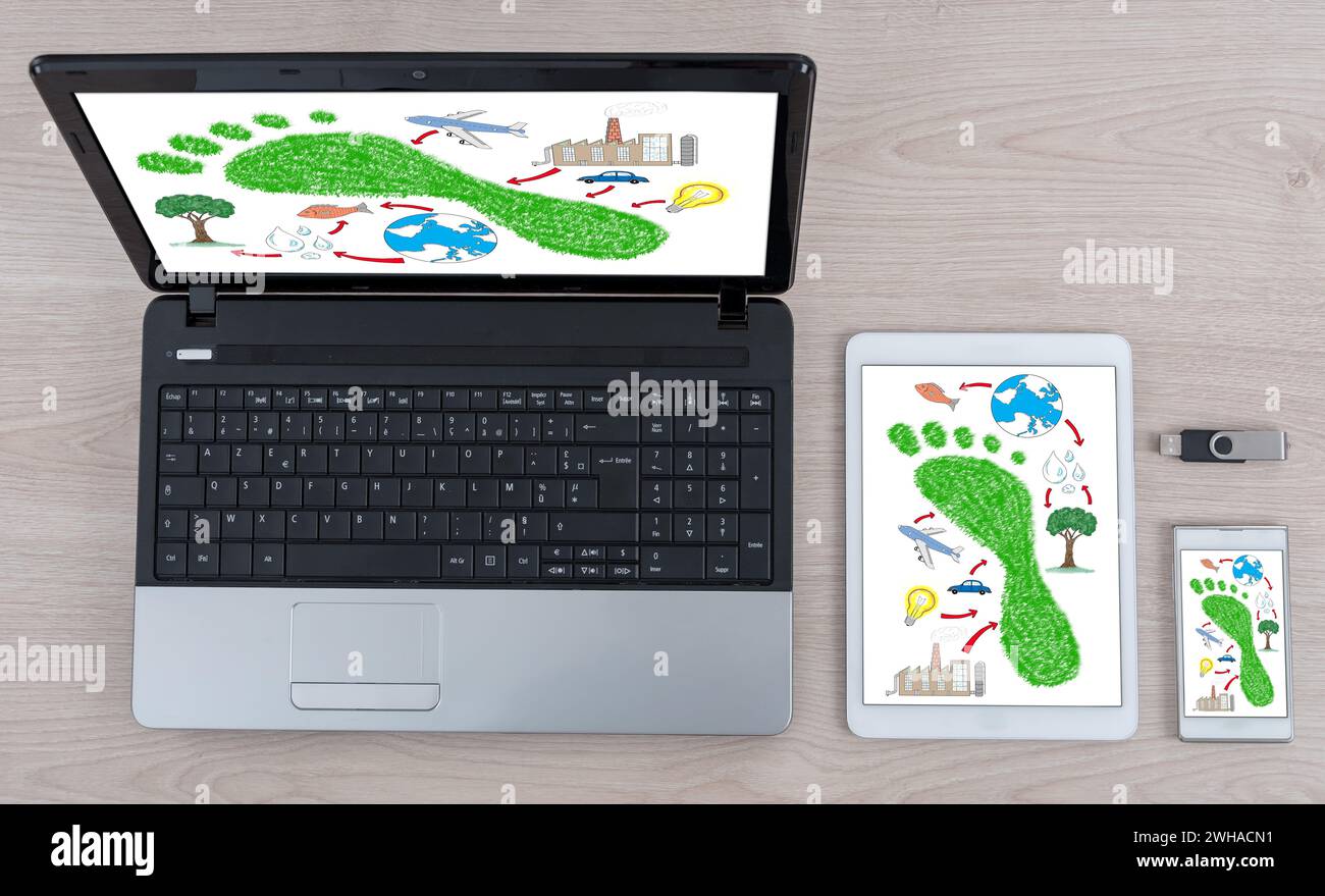 Carbon footprint concept shown on different information technology ...