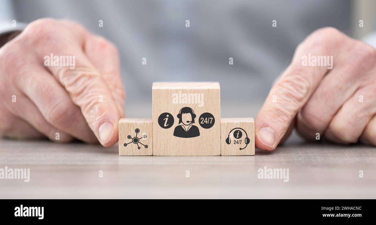 Wooden blocks with symbol of customer service concept Stock Photo - Alamy