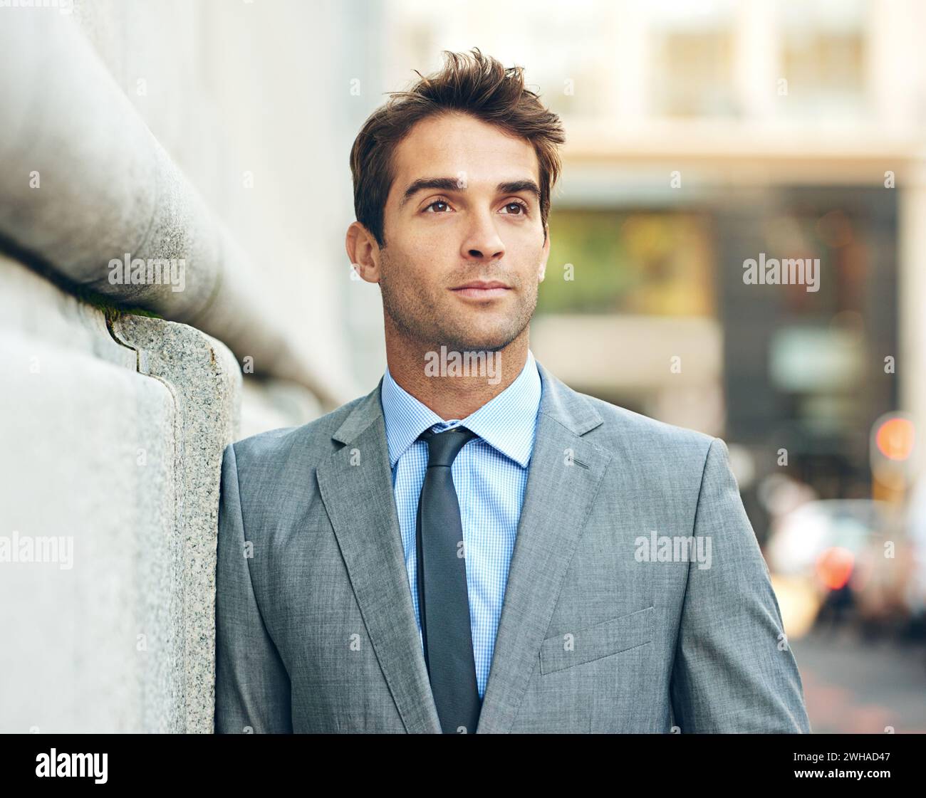 Thinking, idea and businessman in city with brainstorming, planning or ...