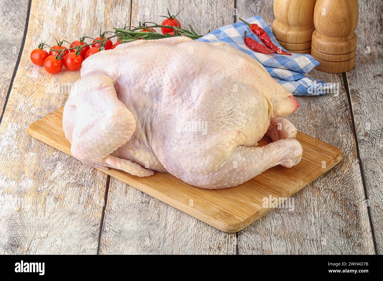 Whole big raw chicken for cooking Stock Photo - Alamy