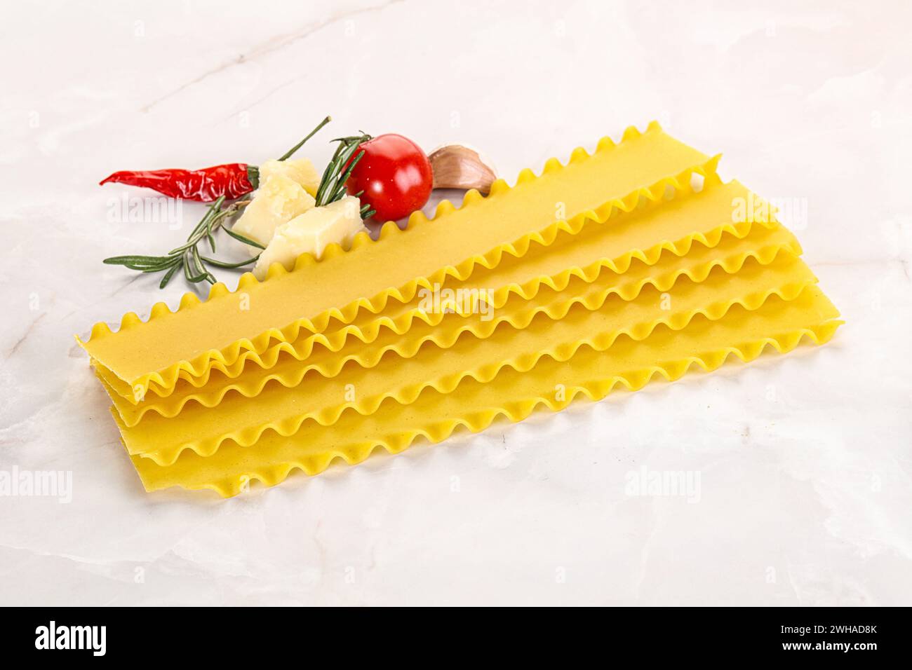 Uncooked raw Lasagna dry sheets for bake Stock Photo - Alamy