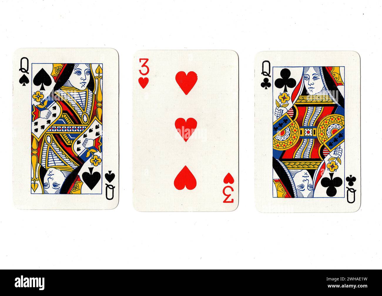 A pair of vintage playing cards showing a pair of black queens and a ...