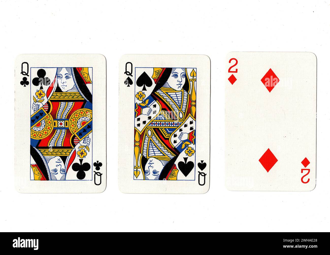 A pair of vintage playing cards showing a pair of black queens and a ...