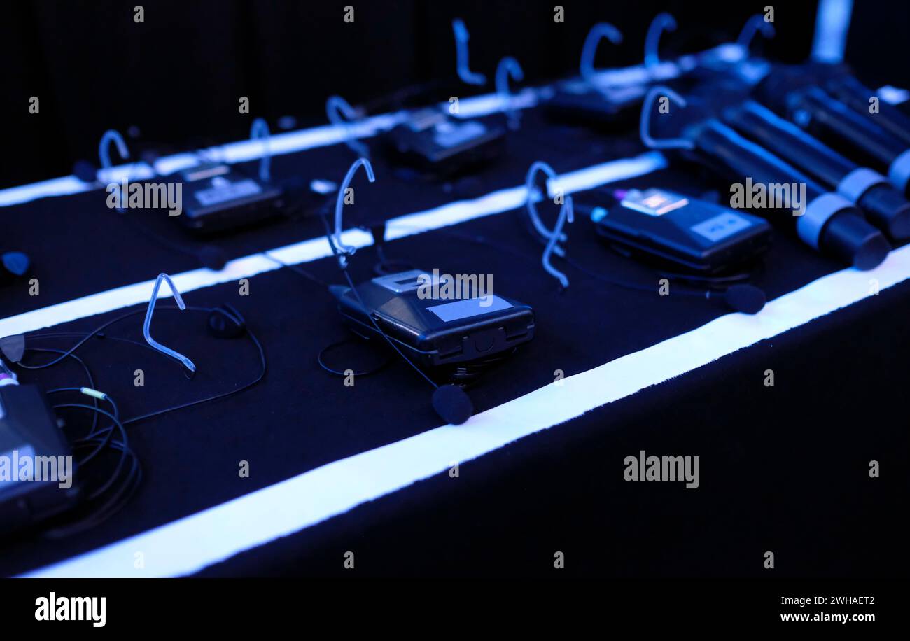 Clip-on microphones ready in the backstage area of a TV production ...