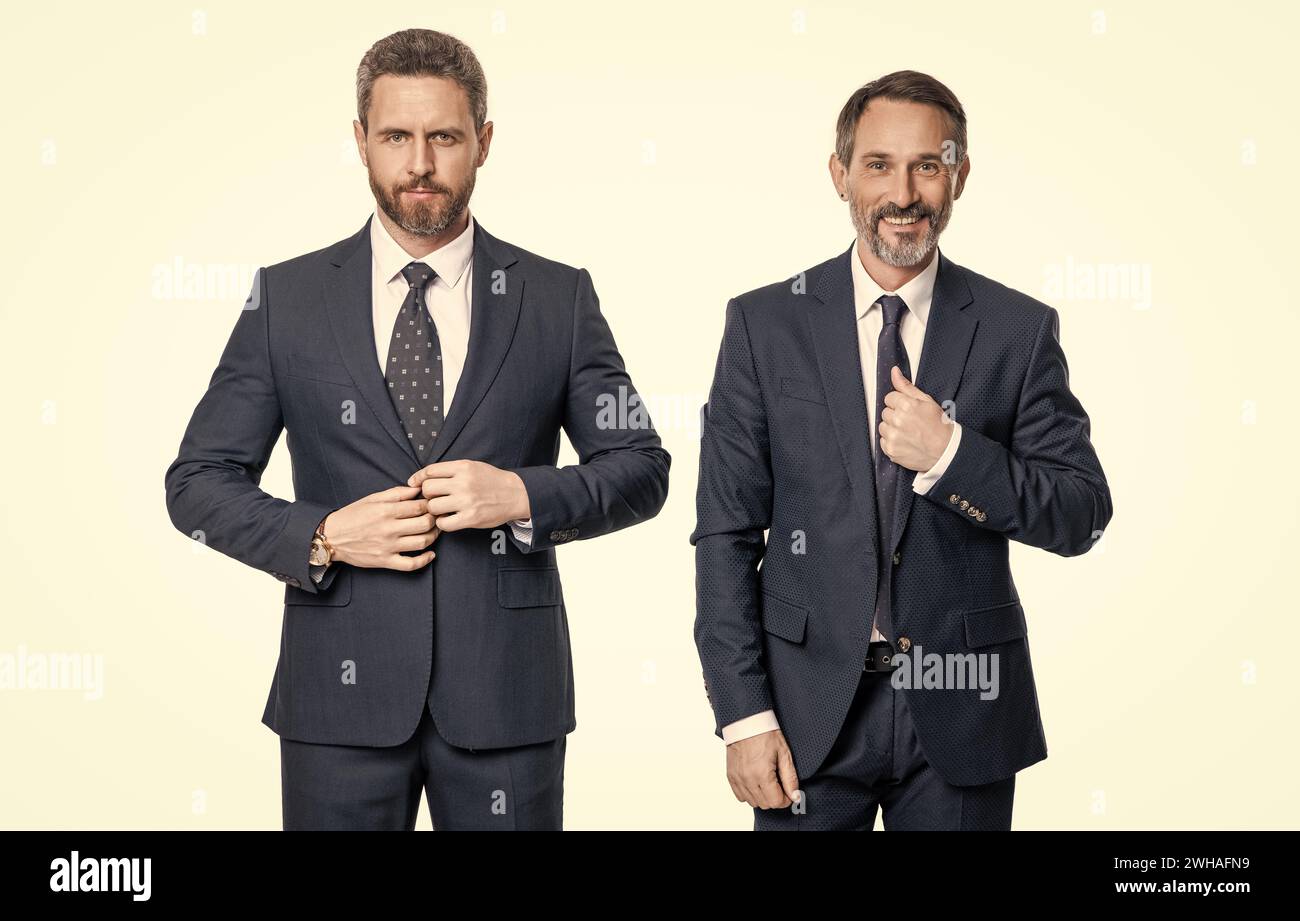 leadership of smiling leader businessmen partners in studio. image of ...