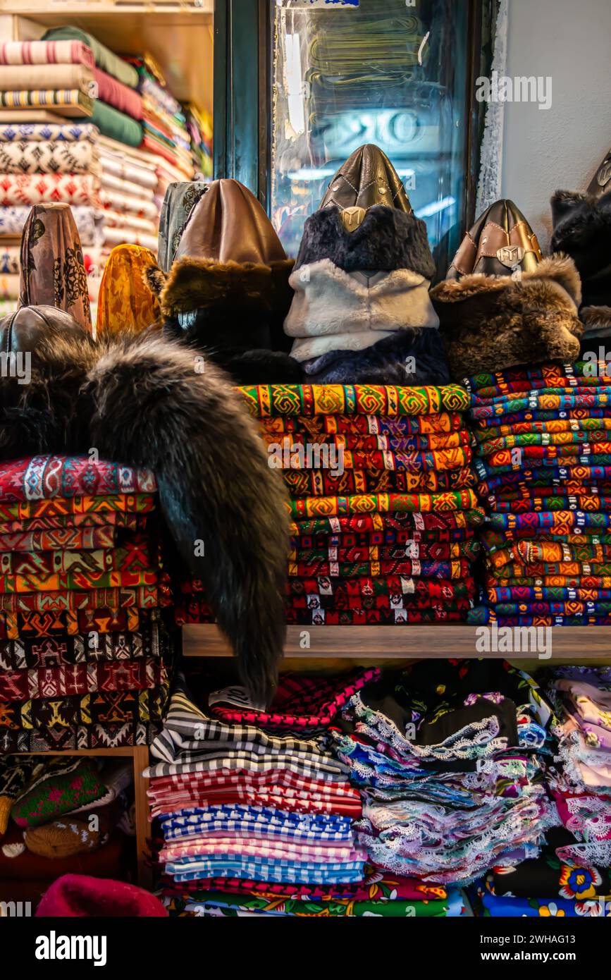 Traditional Turkish hat and clothes in the bazaar, a vibrant display of ...