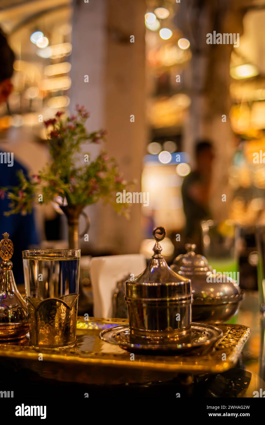 Explore the opulence of an old Turkish coffee set, a vintage display of ...