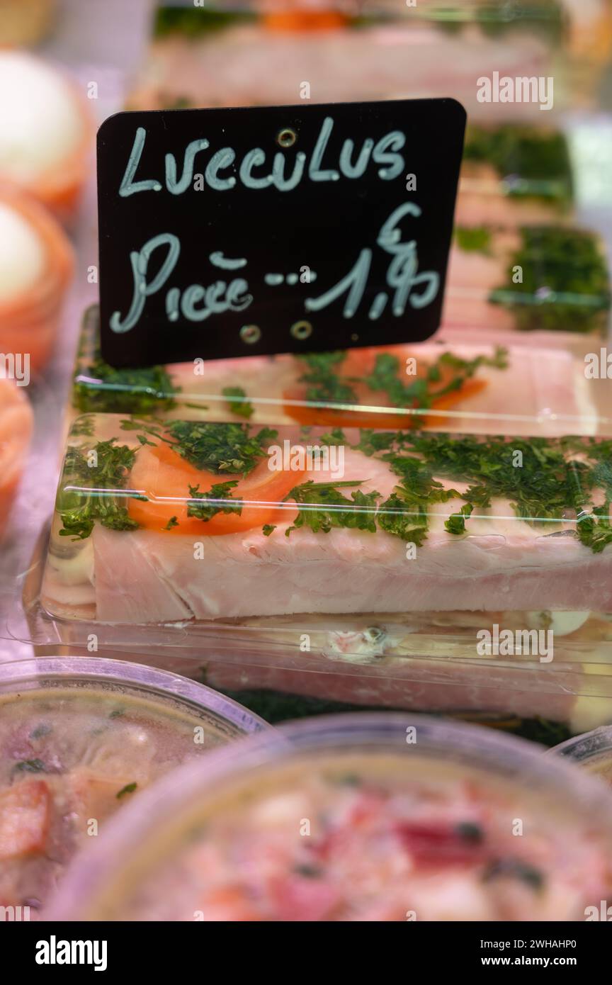 Assortment of meat on weekly food market in France, English translation ...