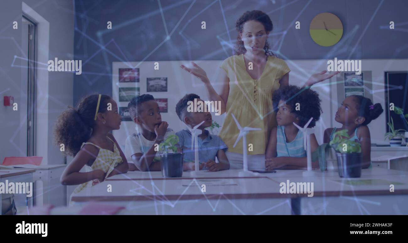 Image of network of connections over happy diverse female teacher and ...