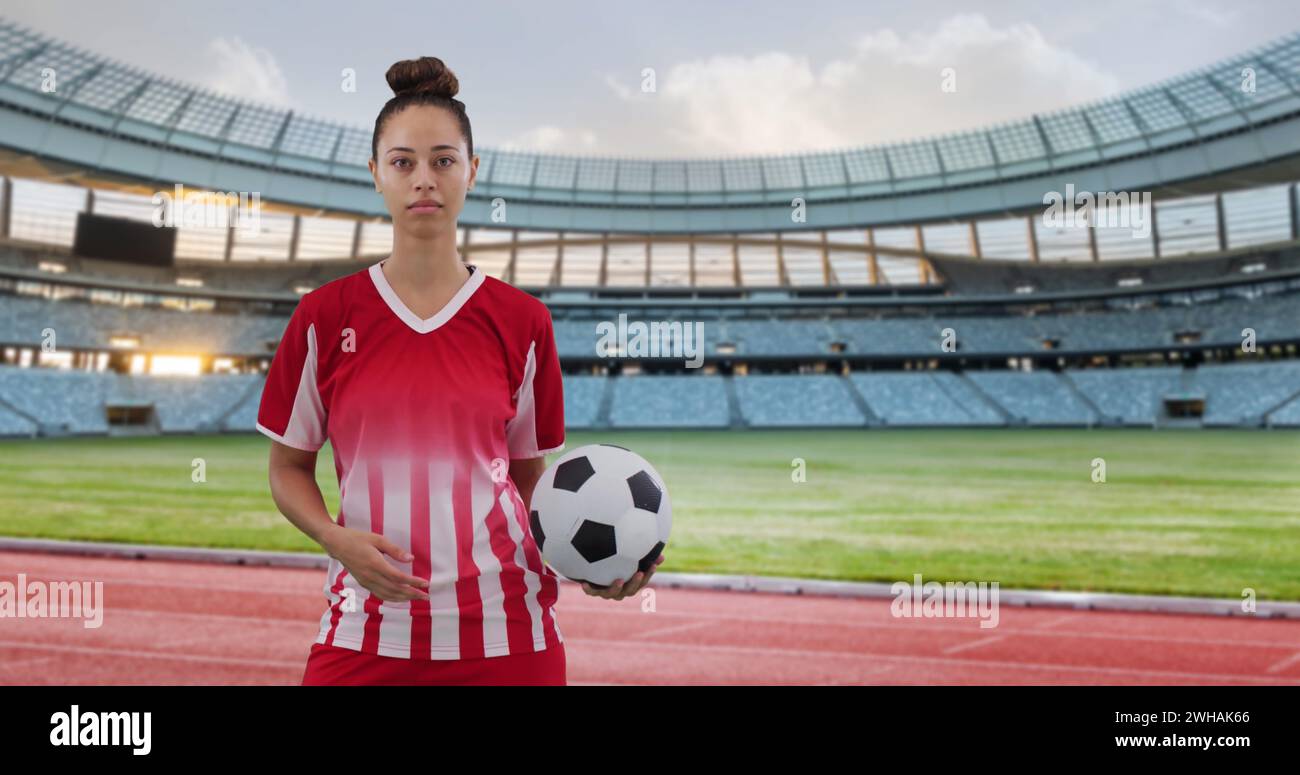 Image of biracial female soccer player over stadium Stock Photo - Alamy
