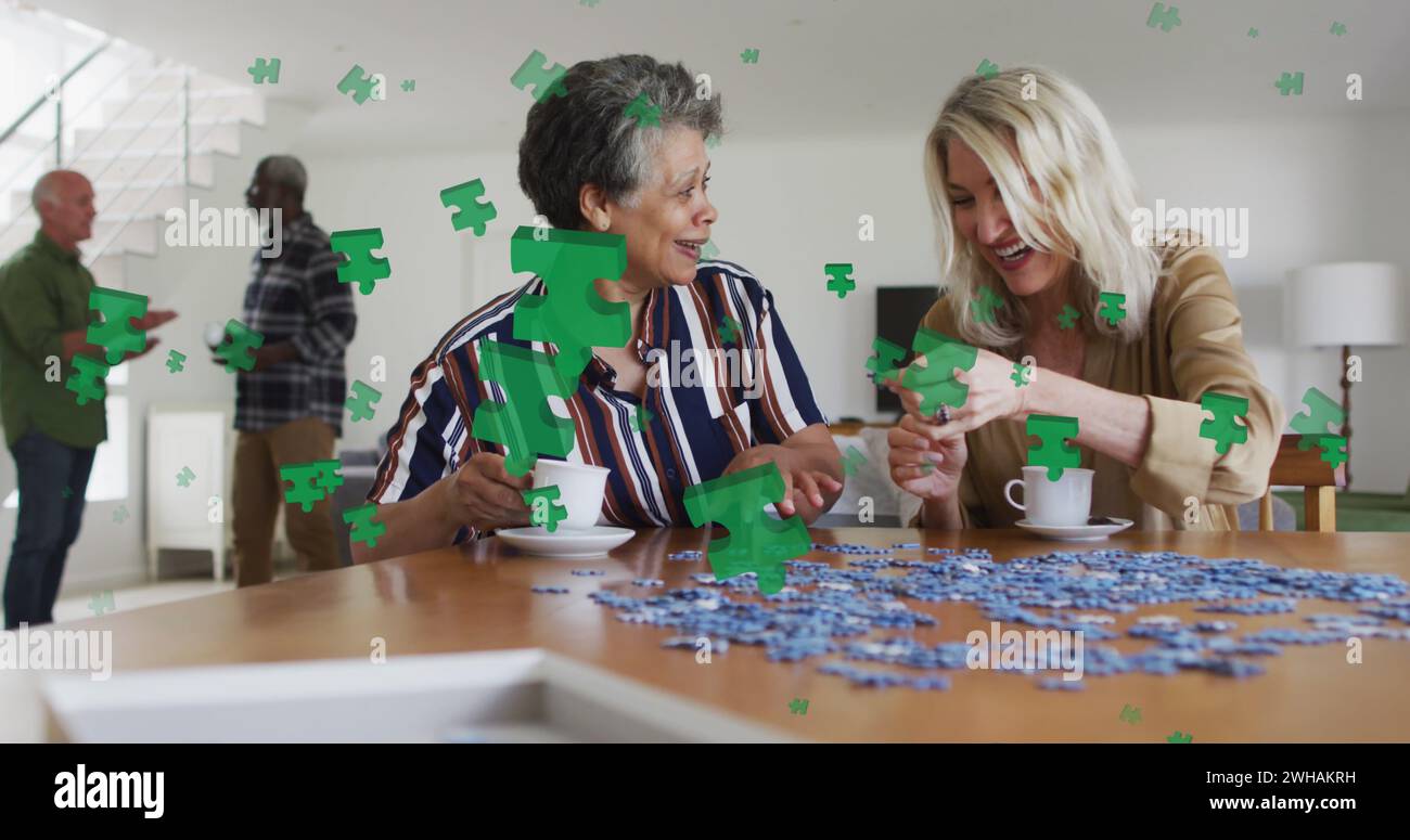Image of puzzle over diverse group of seniors talking Stock Photo - Alamy