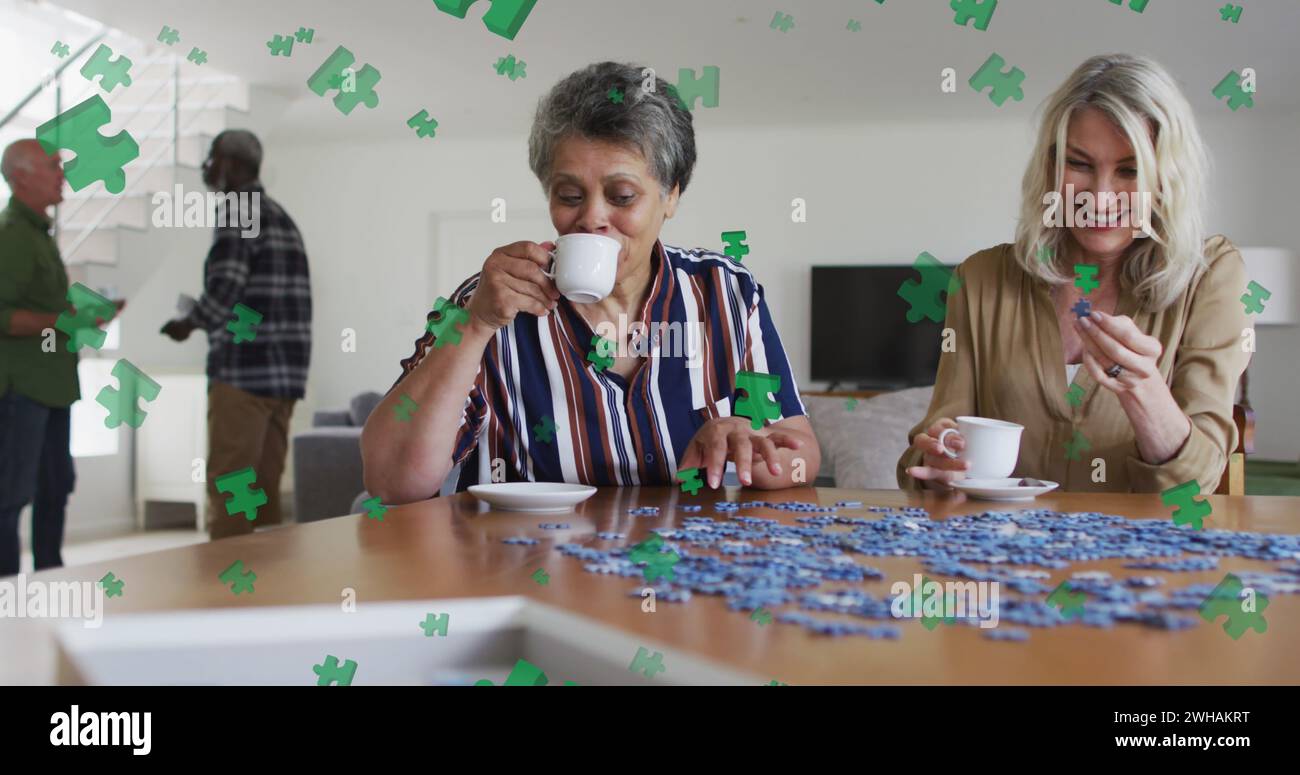 Image of puzzle over diverse group of seniors talking Stock Photo - Alamy