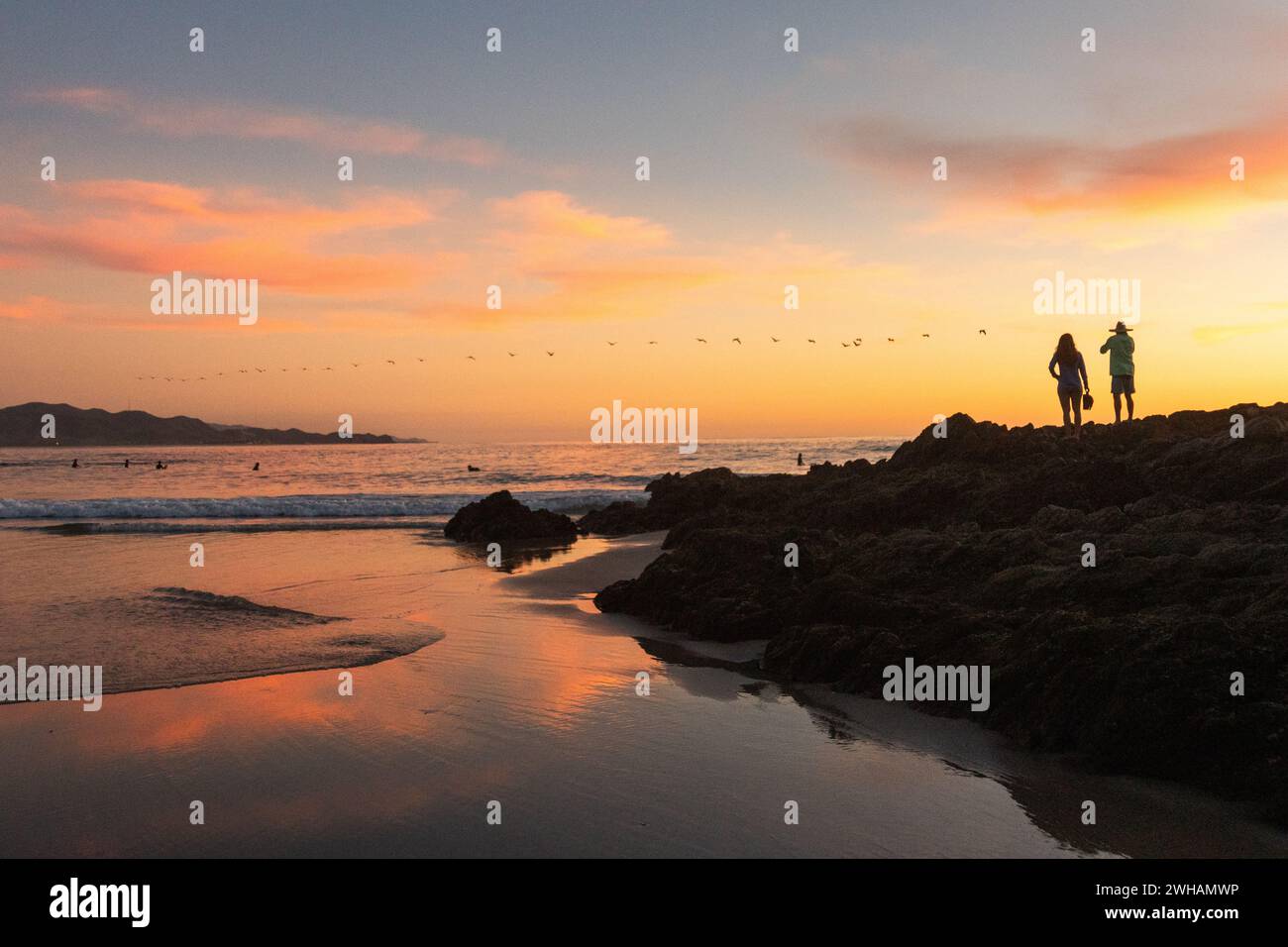 Two people stand hi-res stock photography and images - Alamy