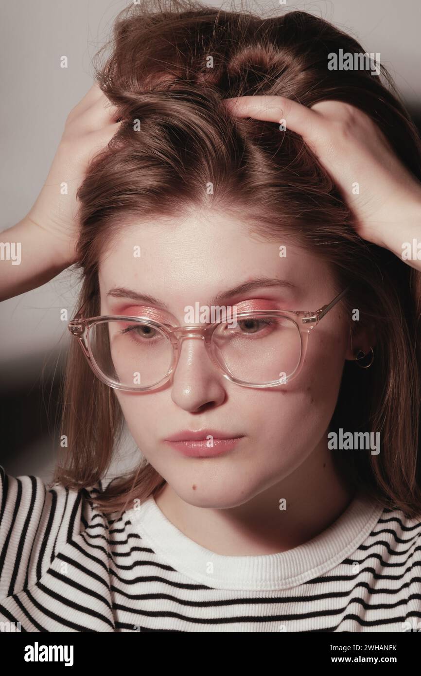 Photo of pretty charming young woman wearing glasses Stock Photo - Alamy