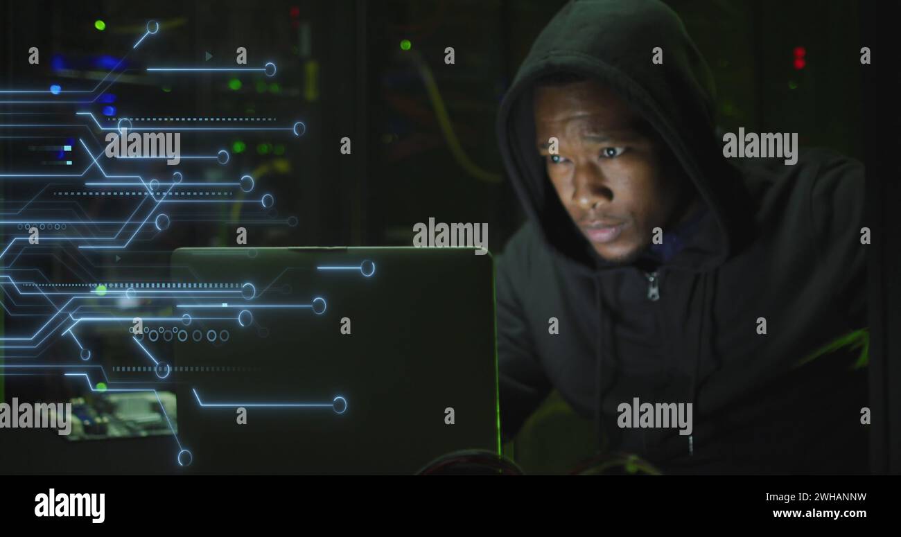 Image of data processing over african american male hacker with computer and computer servers ...