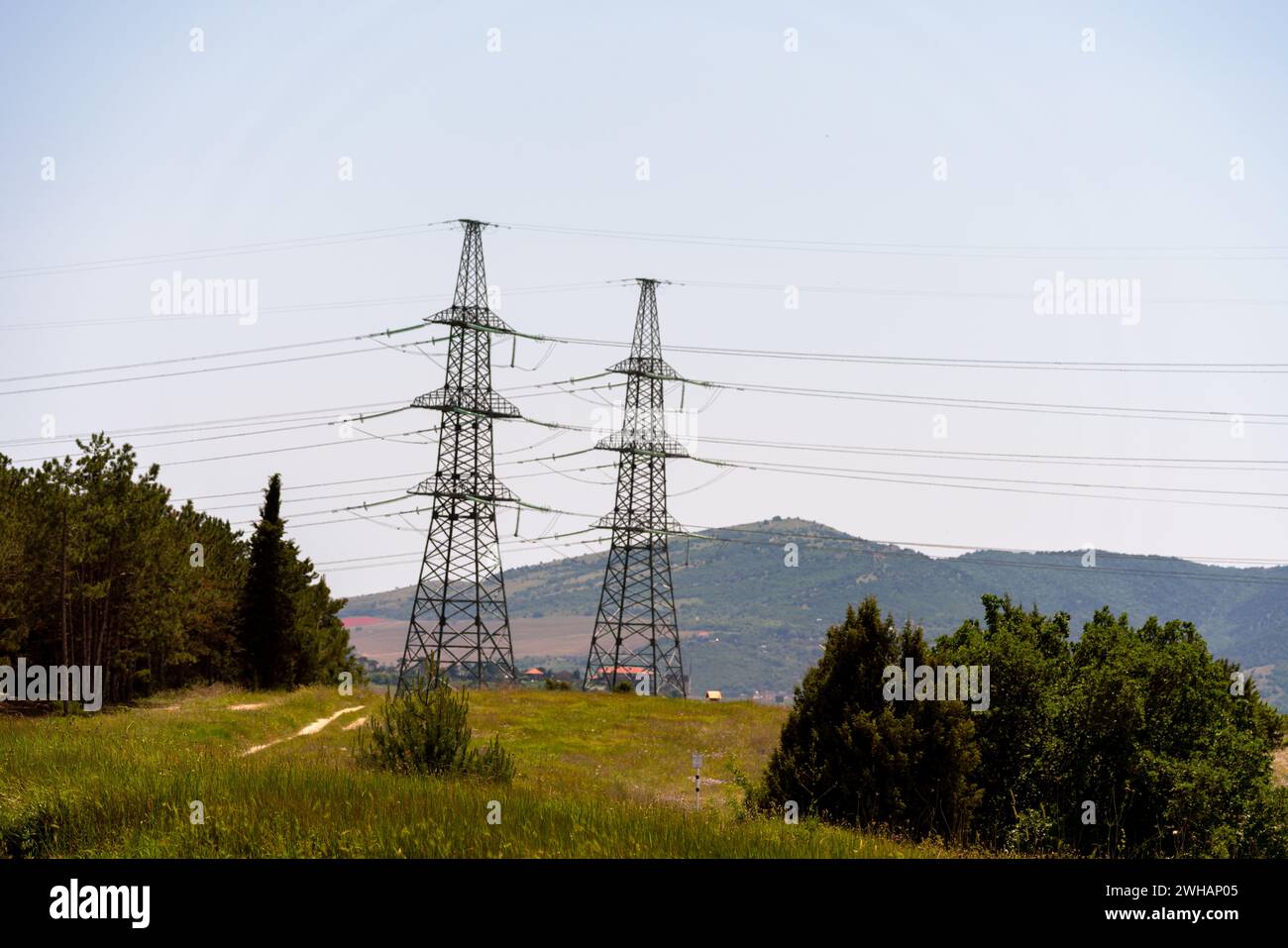 High voltage towers Electric pole. Power line support with wires for ...