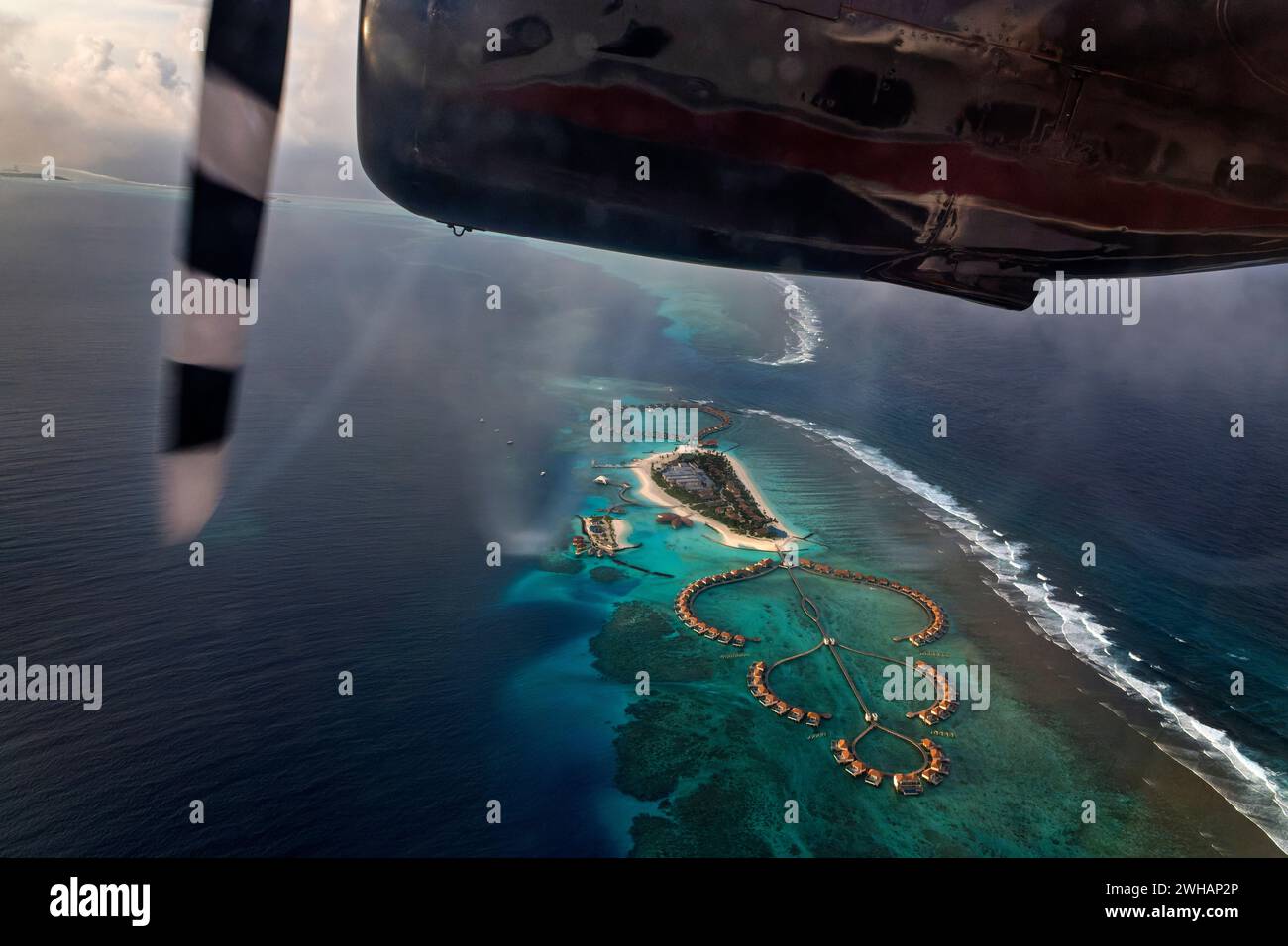 Maldives seaplane flying above islands Stock Photo - Alamy