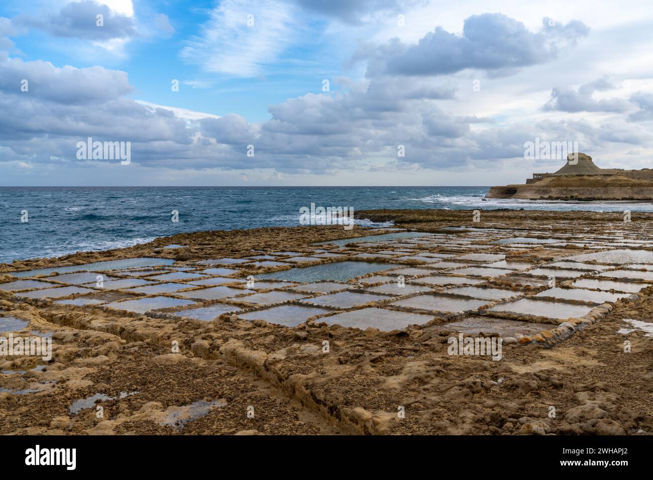 A view of the salt pans in Xwejni Bay on the Maltese island of Gozo ...