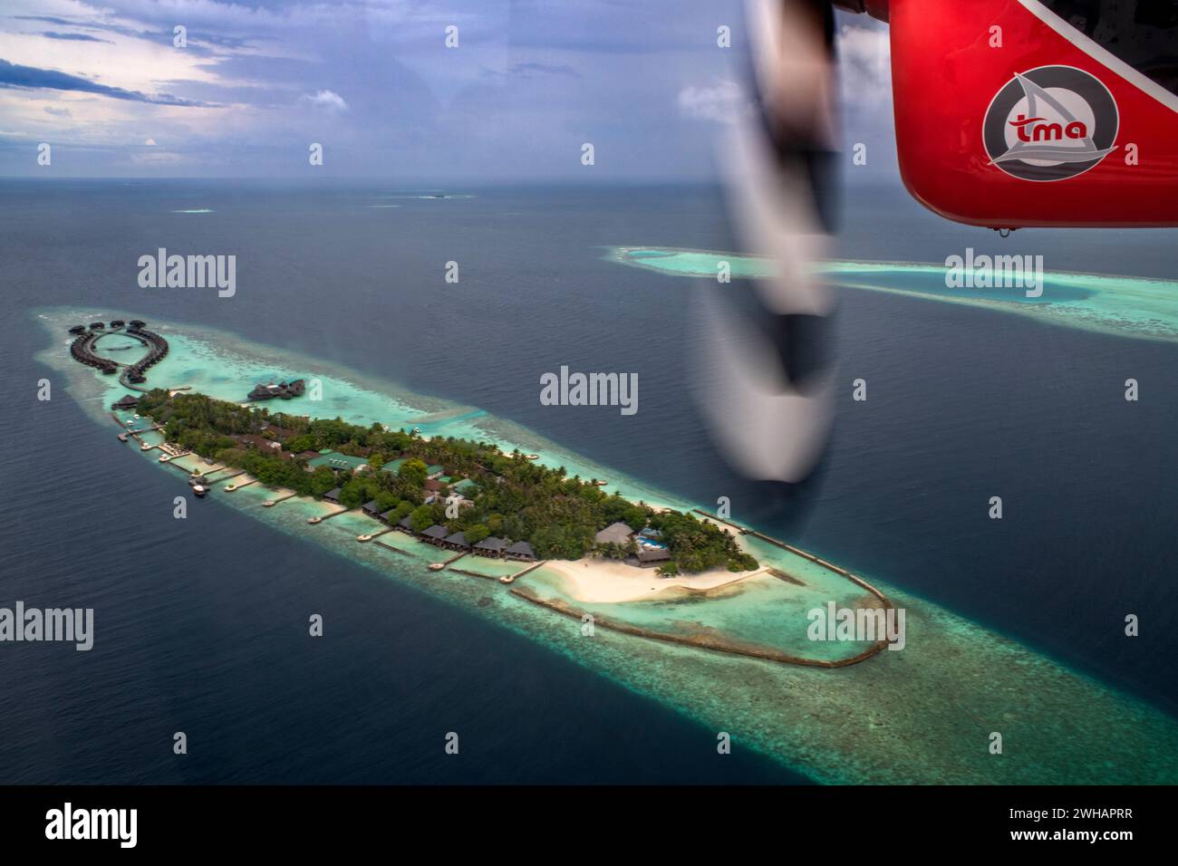 Maldives seaplane flying above islands Stock Photo - Alamy