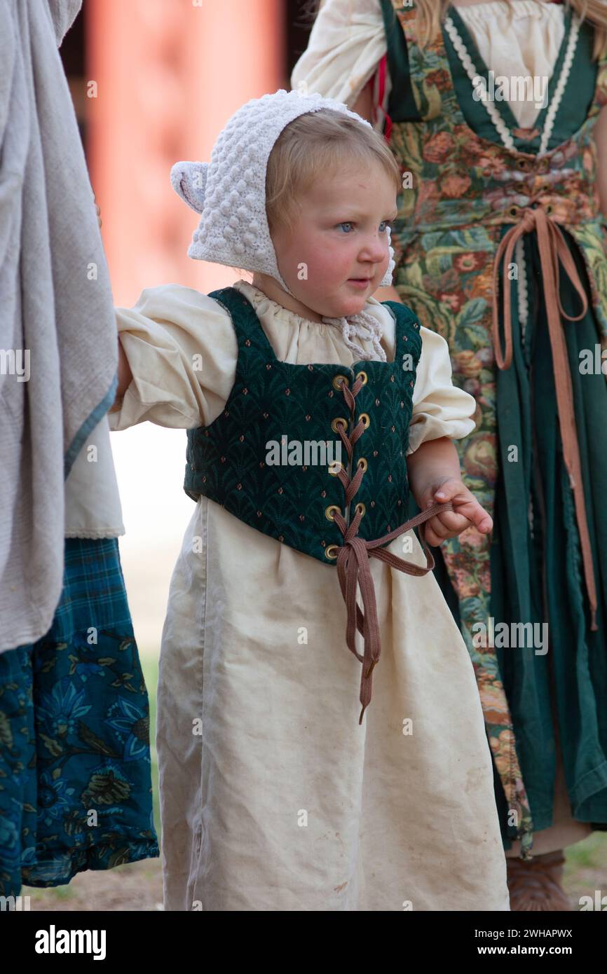 Child dressed in medieval clothes at renaissance fair vertical Stock ...