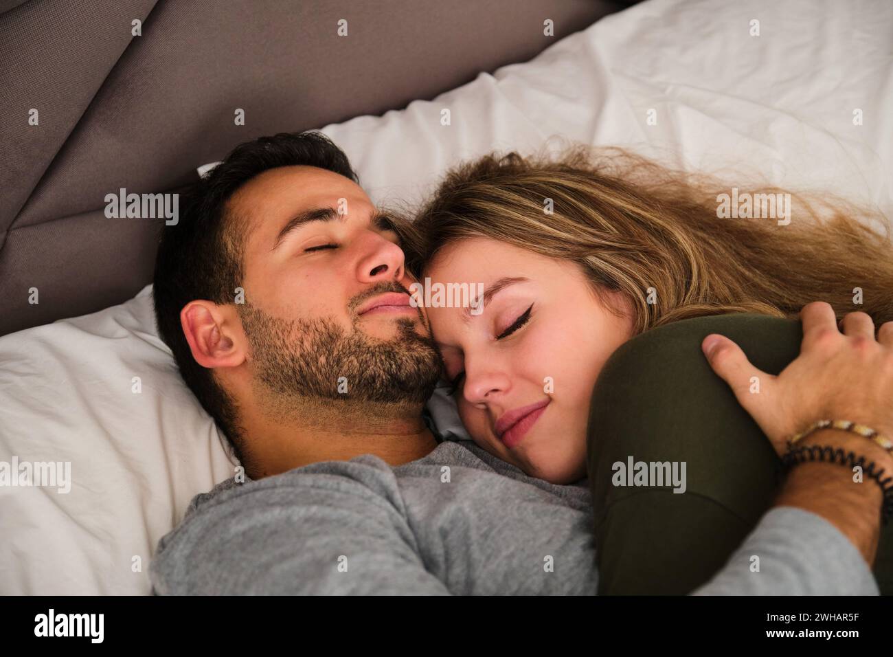 Young romantic couple sleeping on hi-res stock photography and images ...
