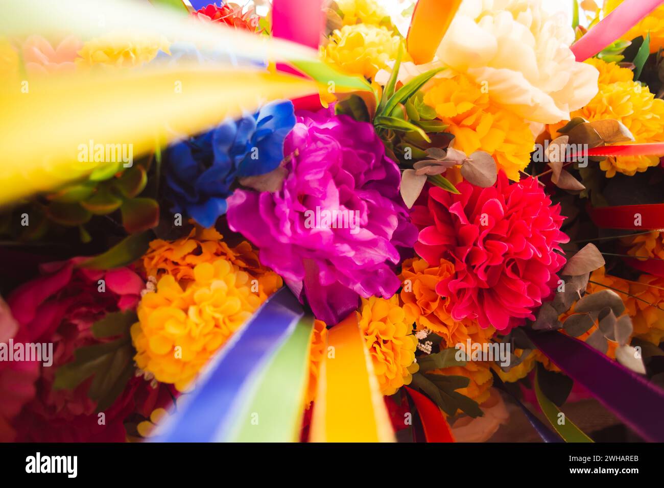 Colorful flower arrangement with ribbons Stock Photo - Alamy