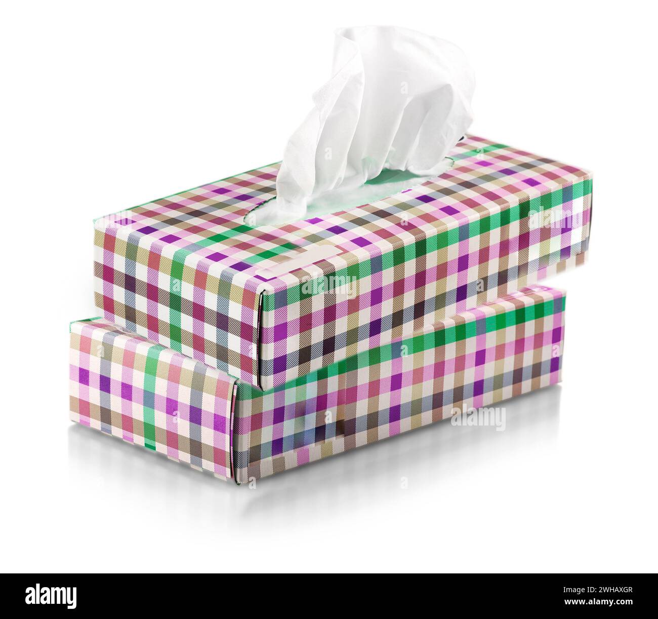 The colored boxes with paper napkins on white background with clipping ...