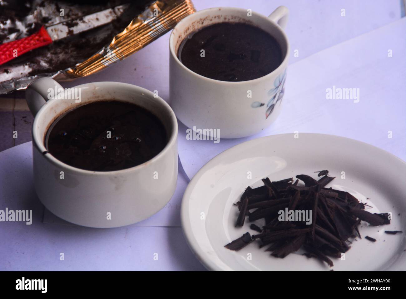 hot chocolate drink in a white cup. Its thick texture is drunk when it ...