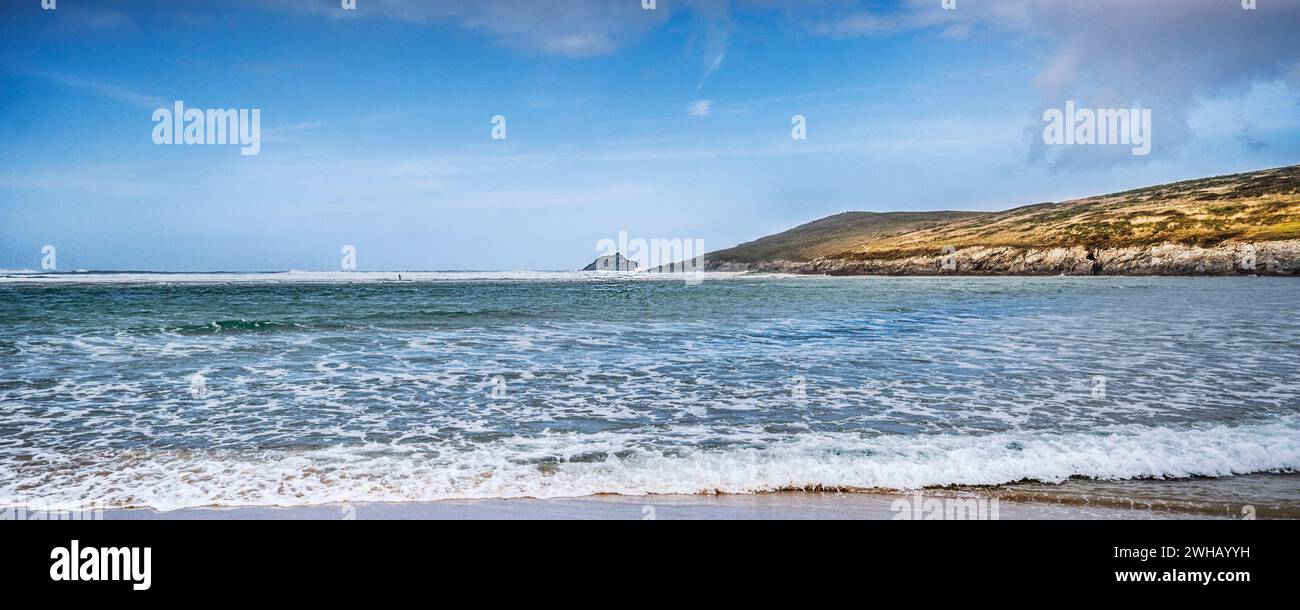 A panoramic image of the Incoming tide at Crantock Beach in Newquay in ...