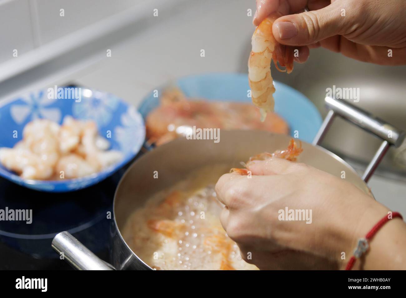 Fish in sauce with shrimp. Step by step preparation. peeling shrimp ...