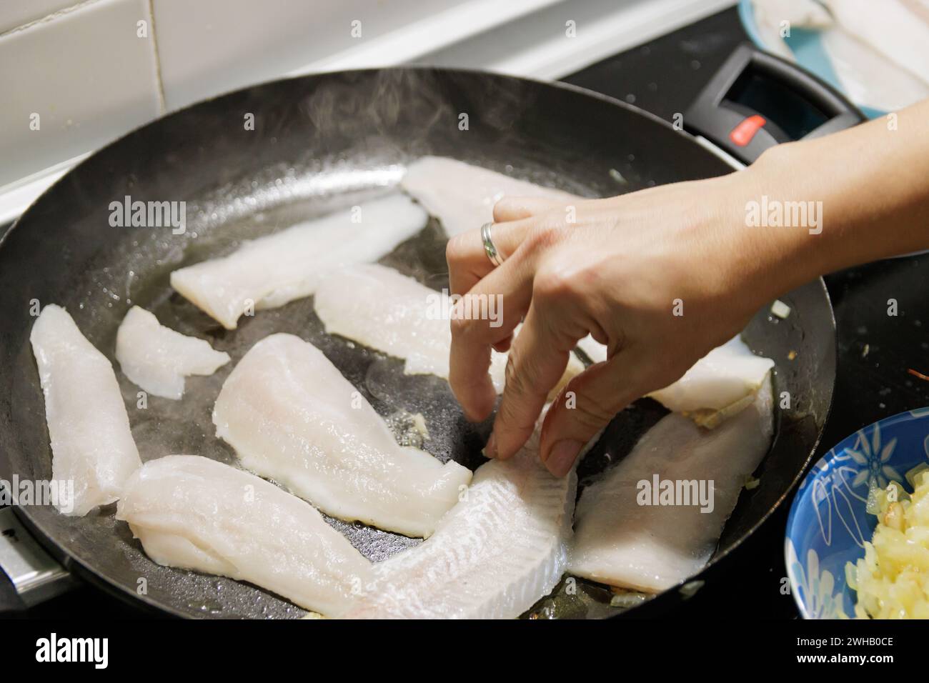 Fish in sauce with shrimp. Step by step preparation. Grilling the fish ...