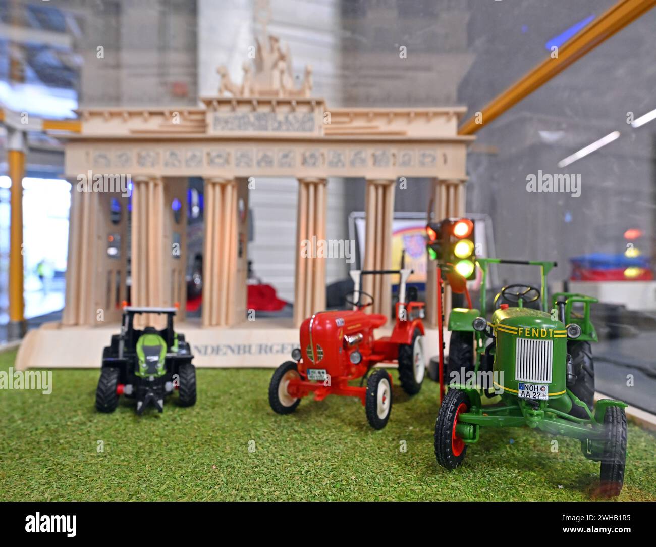 Erfurt, Germany. 09th Feb, 2024. Tractor models stand in front of the ...