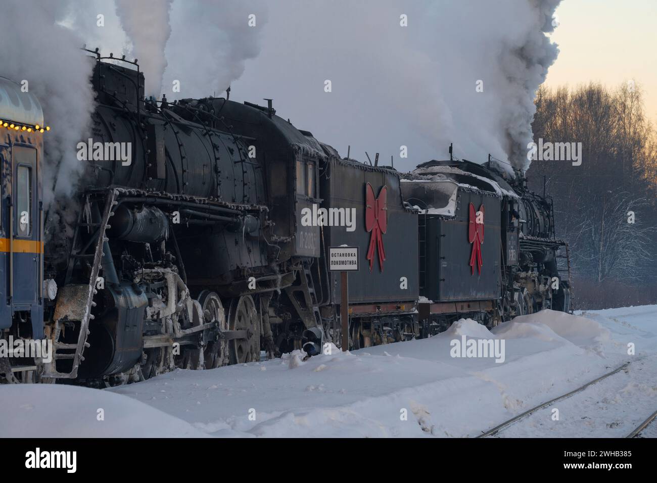 KHELYULYA, RUSSIA - JANUARY 20, 2024: Retro steam locomotives of the ...