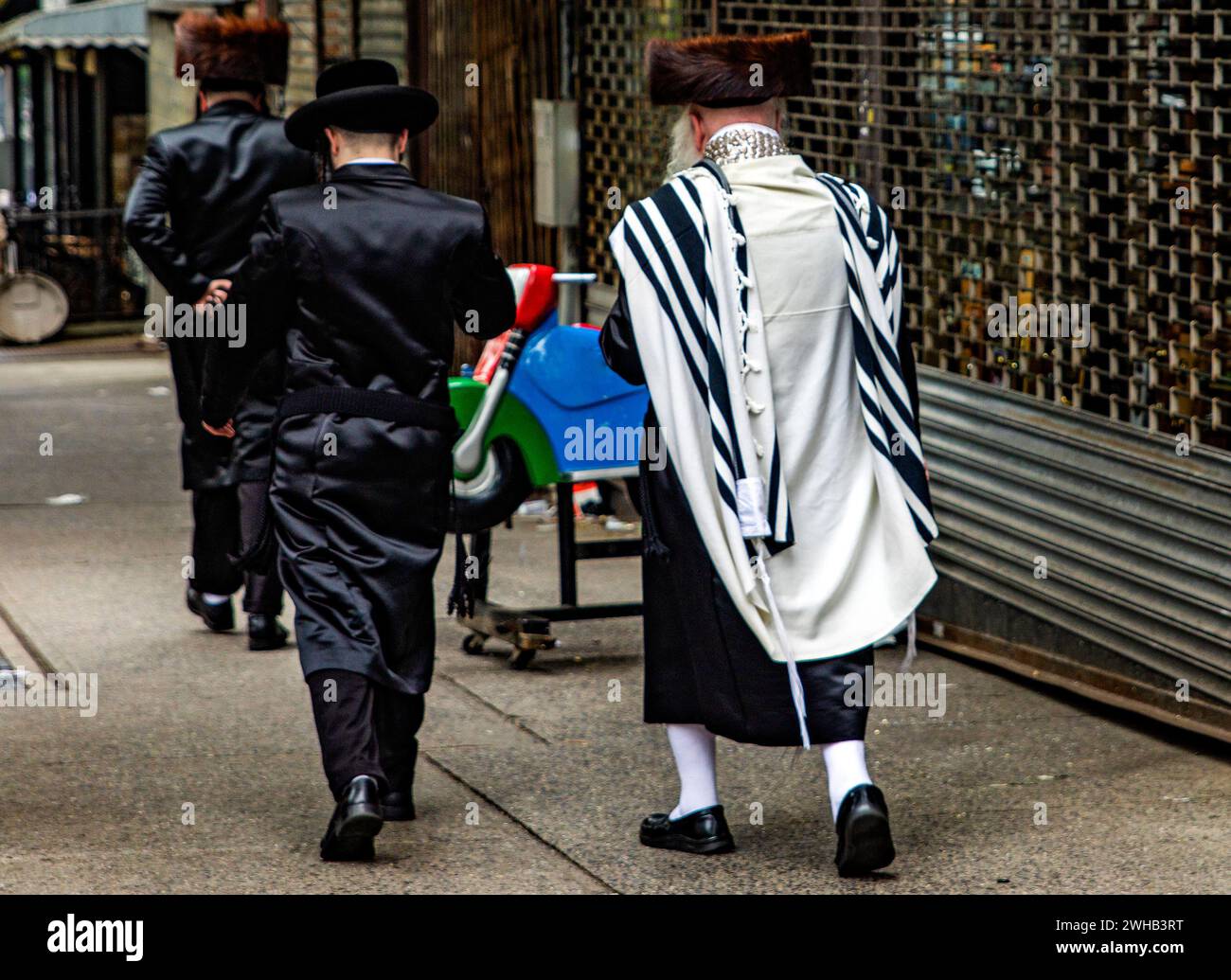Three orthodox Jewish men in the Williamsburg neighborhood of Brooklyn ...
