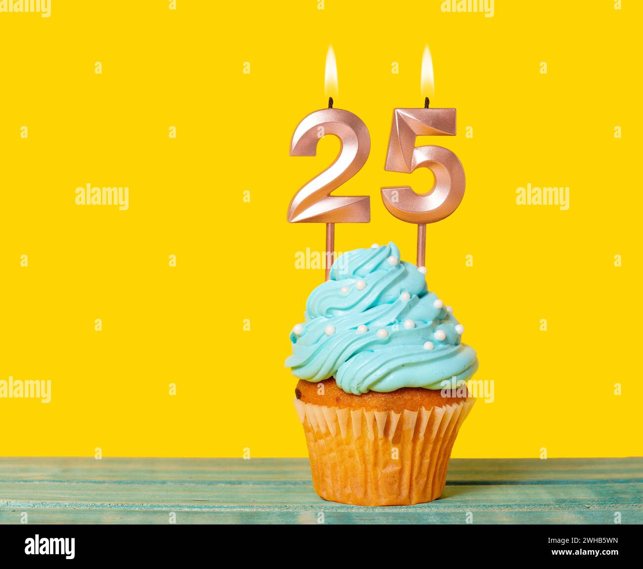 Birthday Cake With Candle Number 25 - On Yellow Background Stock Photo ...