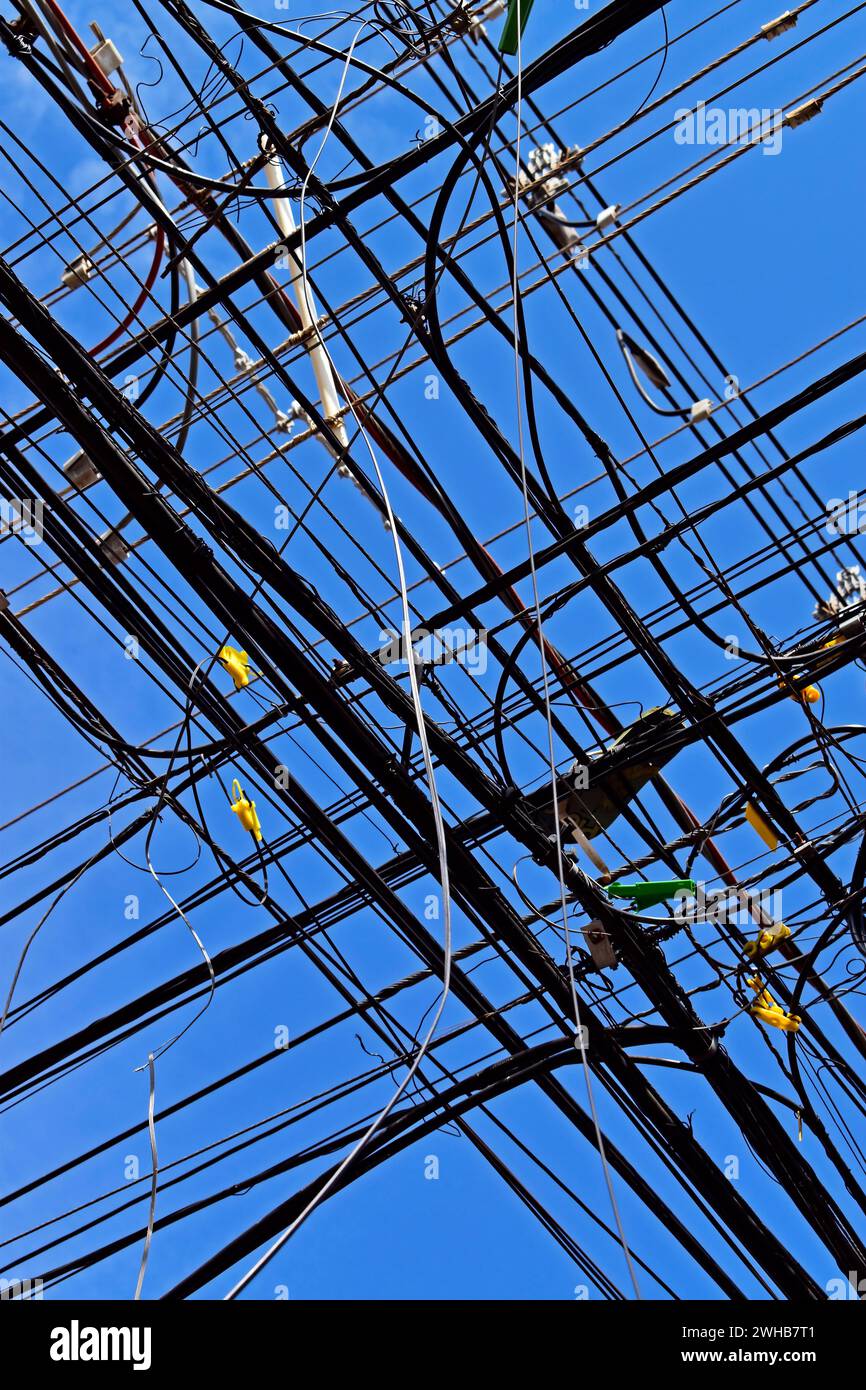 Electrical wires crossing and blue sky in Ribeirao Preto, Sao Paulo ...