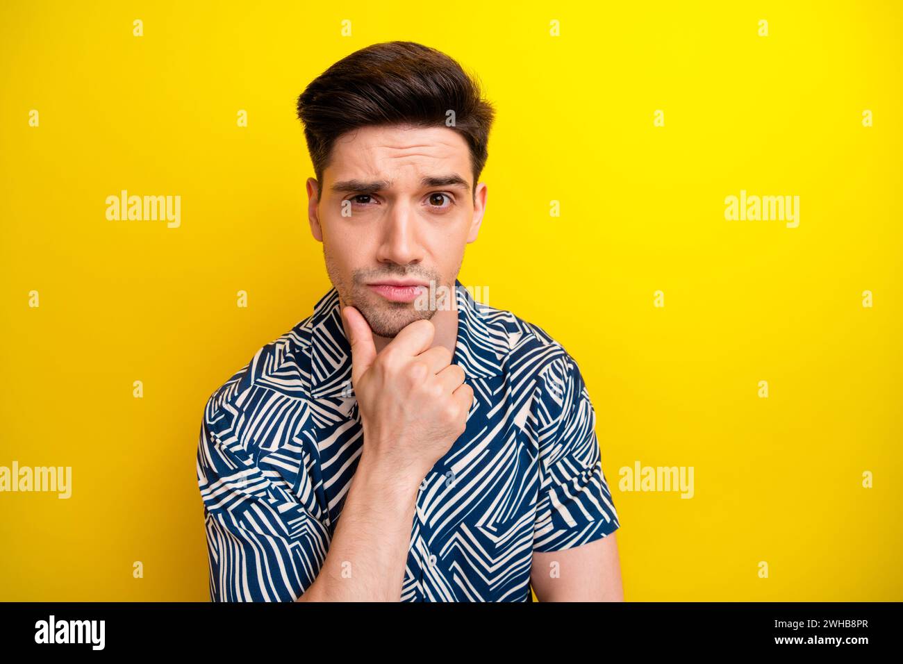 Photo of minded clever person arm touch chin contemplate empty space isolated on yellow color ...