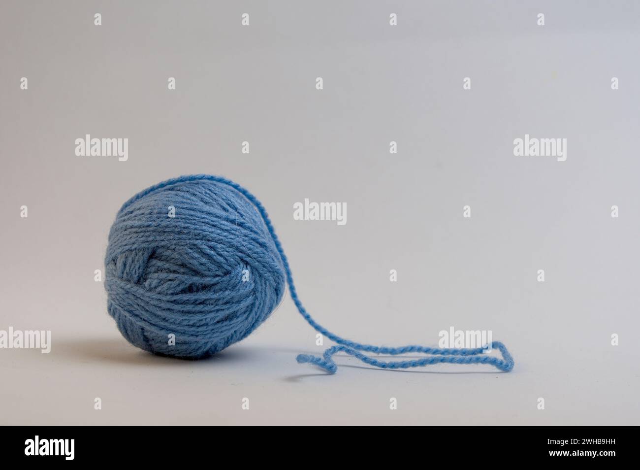 balls of wool on white background Stock Photo - Alamy