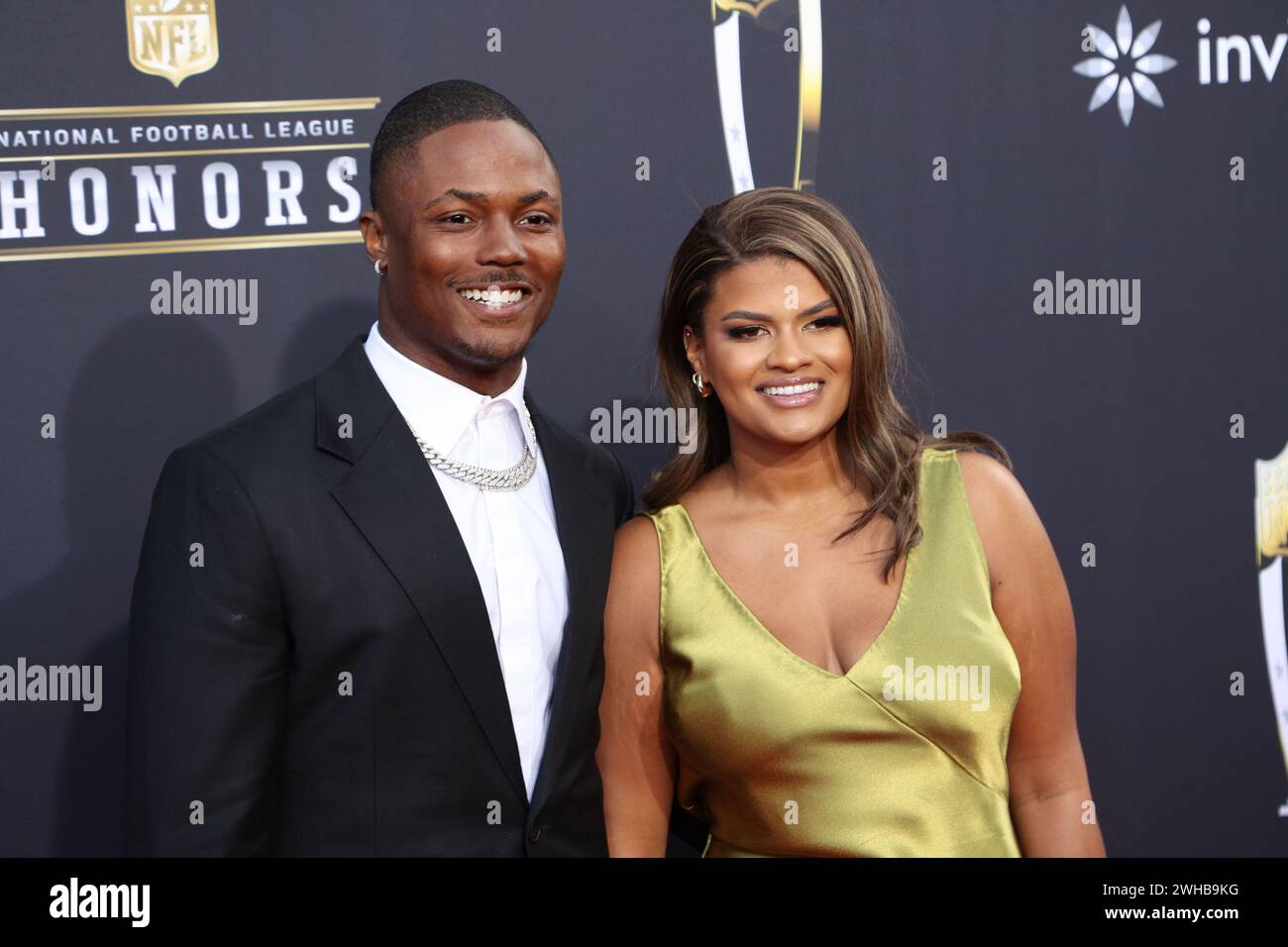 (L-R) Terry McLaurin and Caitlin Winfrey arrive on the red carpet at ...