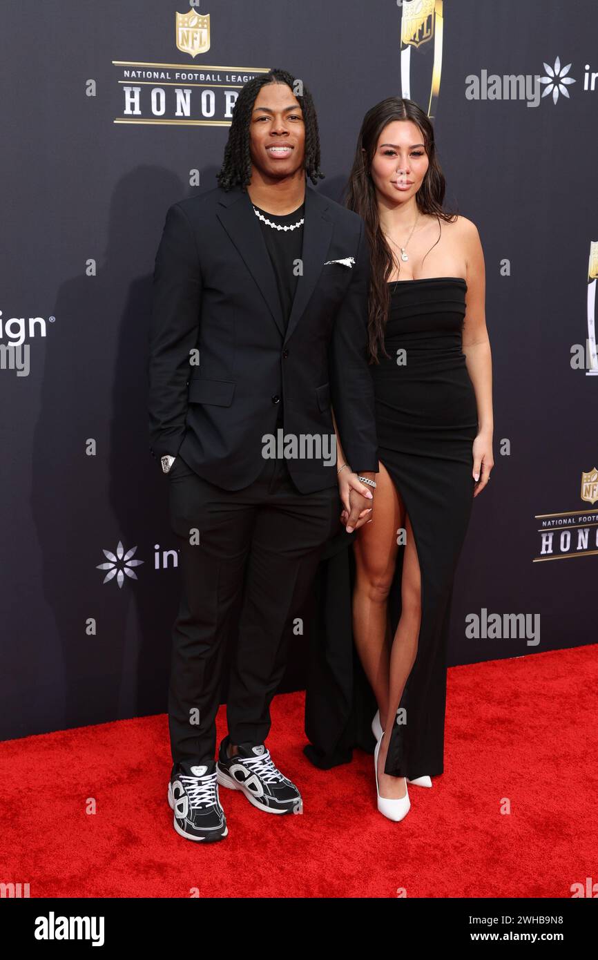 Las Vegas, United States. 08th Feb, 2024. (L-R) Jahmyr Gibbs and Nicole ...