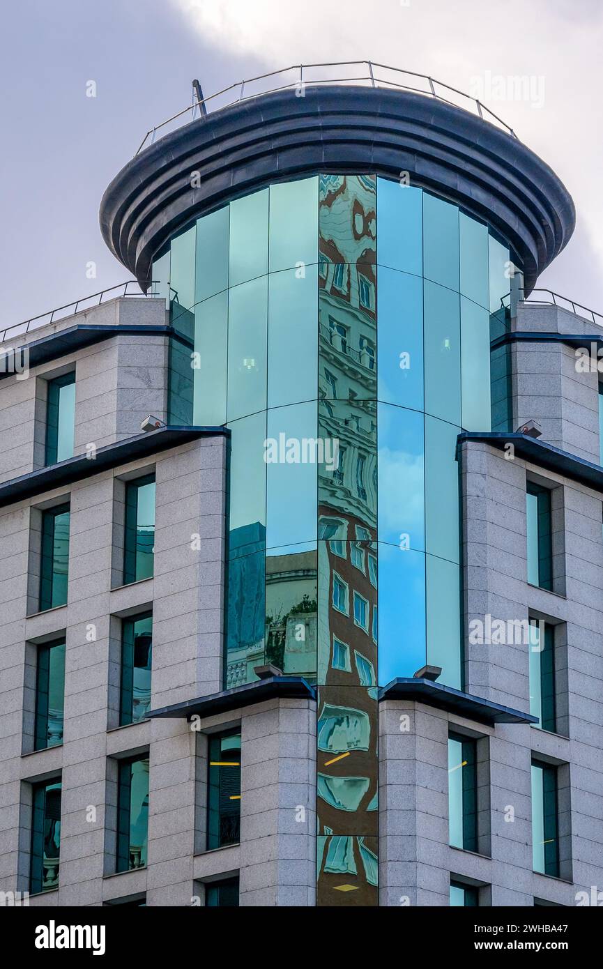 Modern glass capital structure in building facade, Madrid, Spain Stock ...
