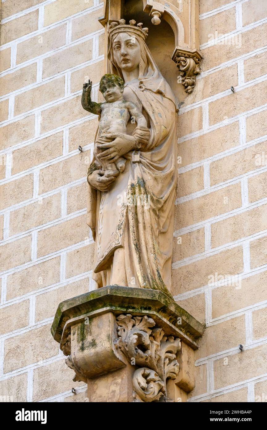 Stone statue of a religious saint in medieval church, Madrid, Spain ...