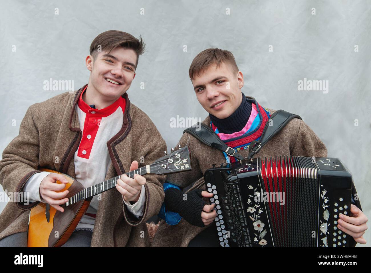 Celebration of Maslenitsa in Russia. At the fair, teenagers play ...