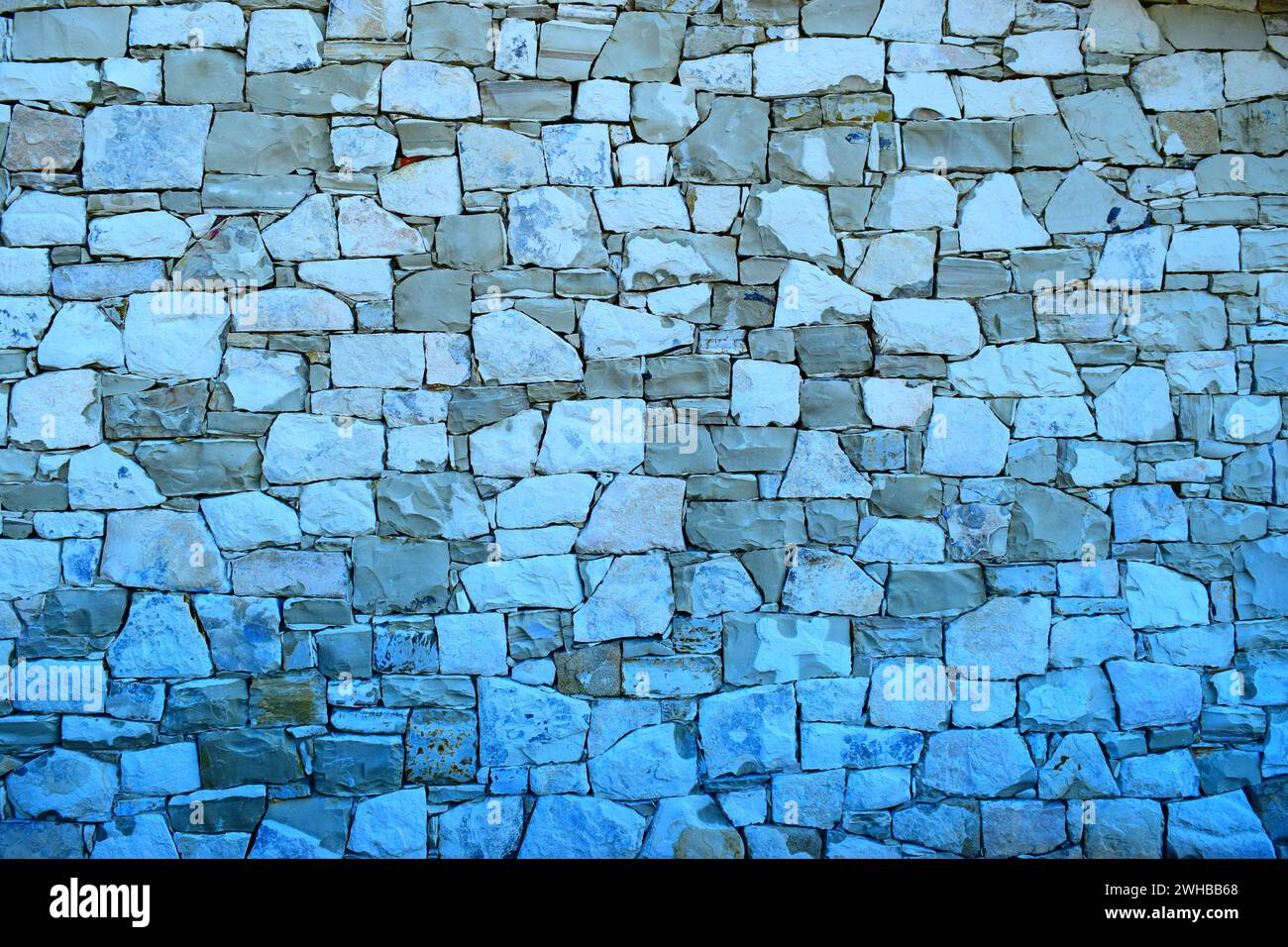 Stone wall texture background.Front view close up Stock Photo - Alamy