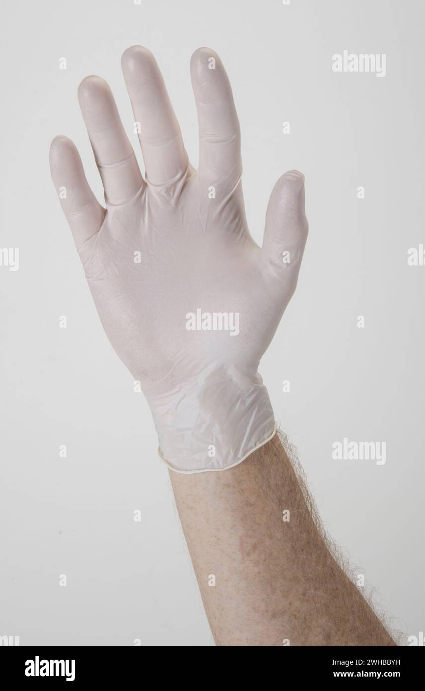 Hand with glove Stock Photo - Alamy