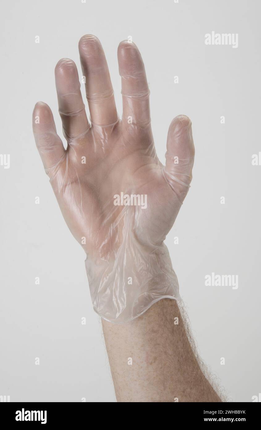 Hand with glove Stock Photo - Alamy