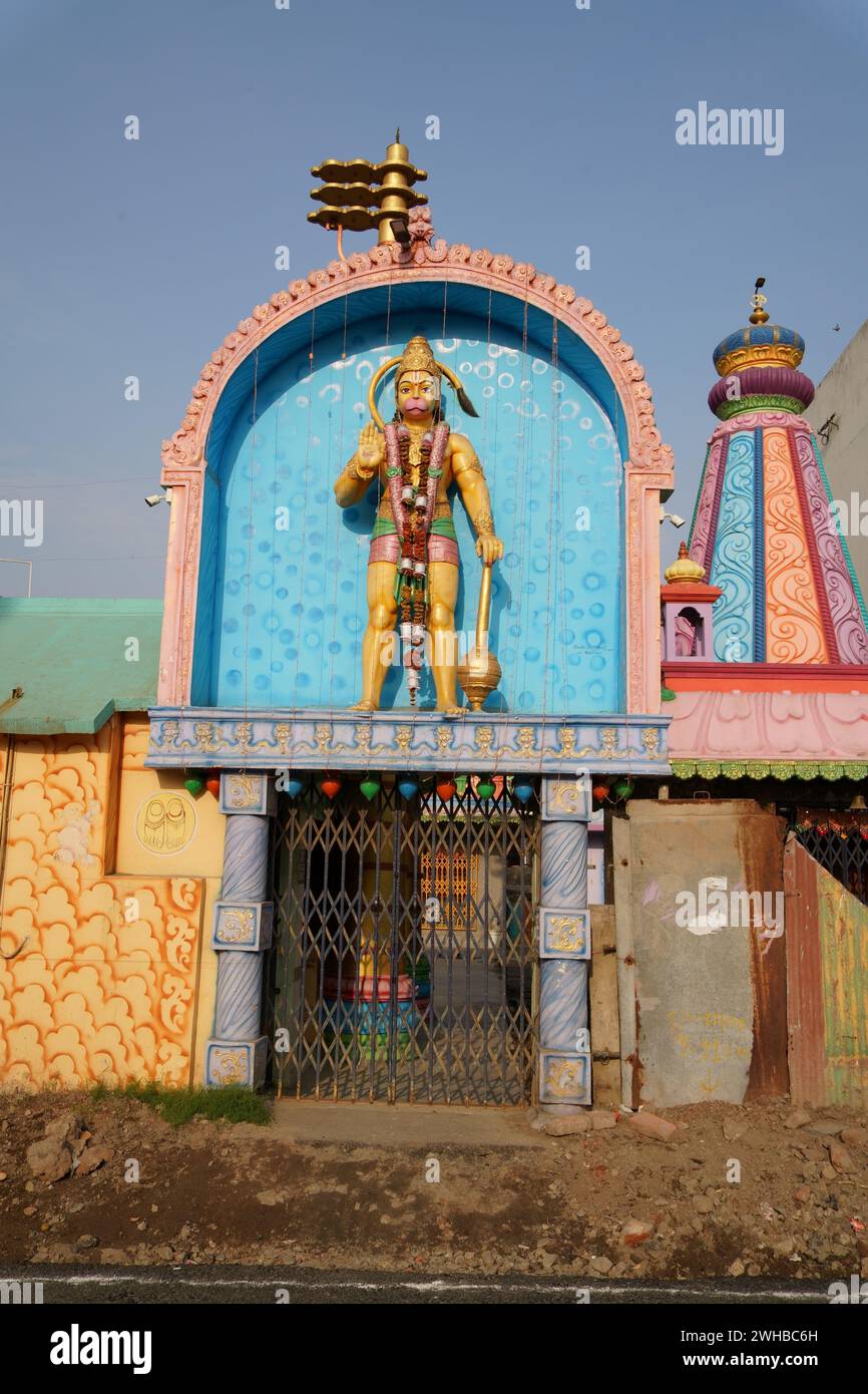 Ram and Venkateswar mandir entrance with Hanuman statue on top ...
