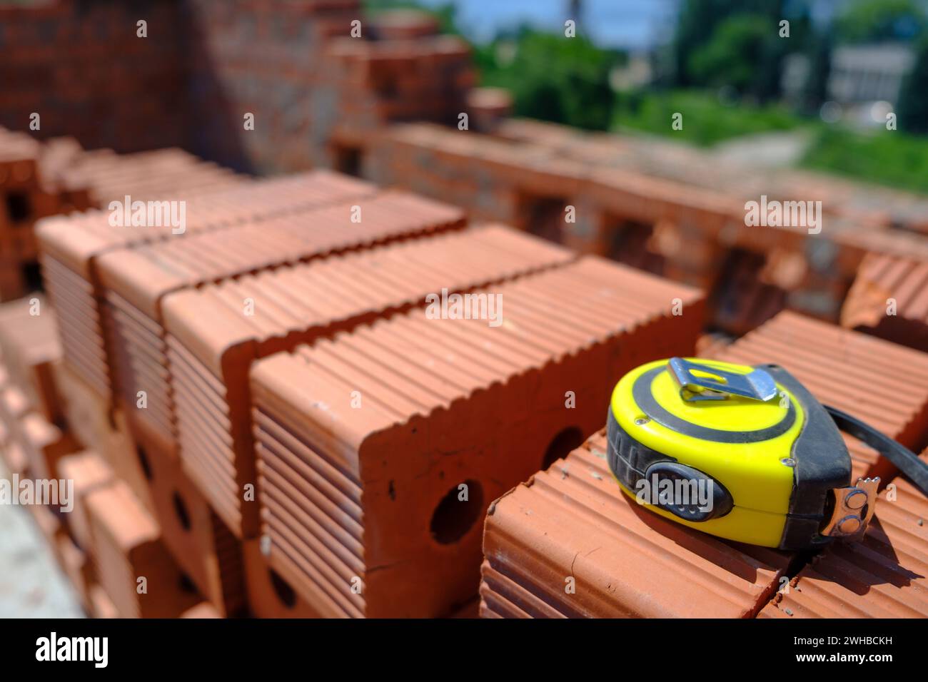 measure tape is on the concrete floor after usage for construction site ...