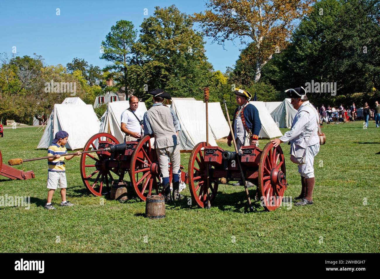 troop reenactment, soldiers, historic reenactors, small white tents ...