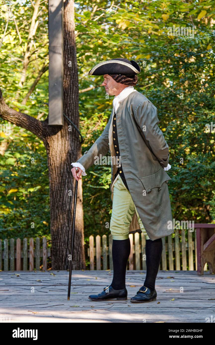 Colonial gentleman, historic reenactor, standing, side view, cane ...